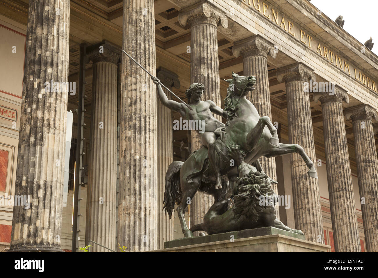 One of the statues at the entrance of The Altes Museum in Berlin. The ...