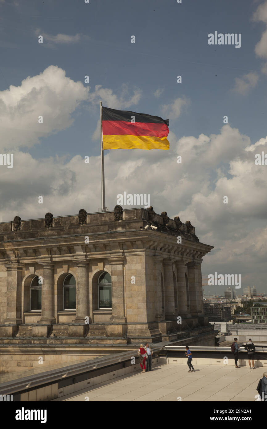 the German flag flies above the Reichstgag Building home of the German ...