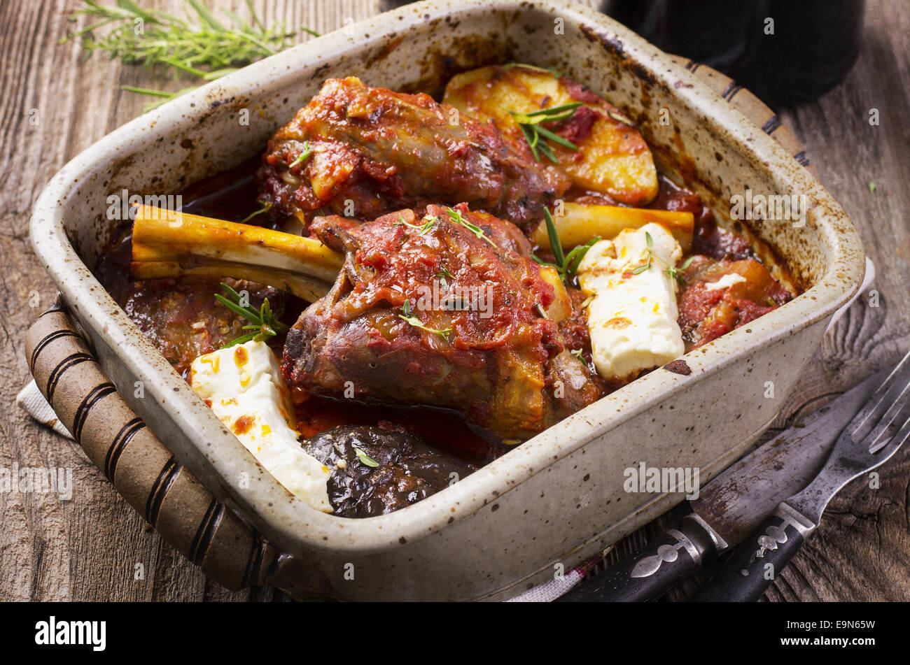 lamb knuckles with feta and eggplant Stock Photo - Alamy