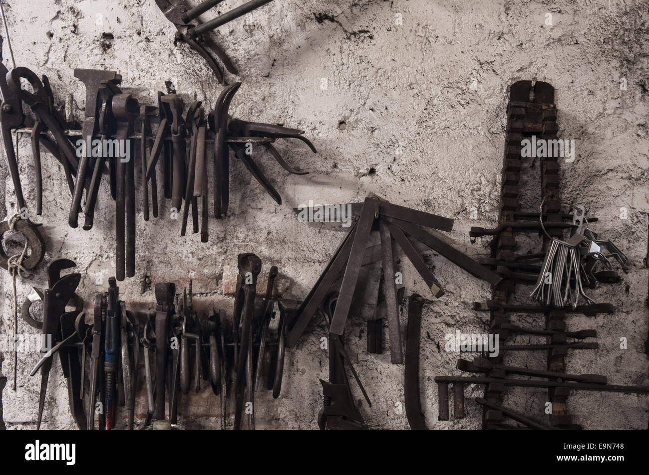 Blacksmith tools in a forge Stock Photo - Alamy