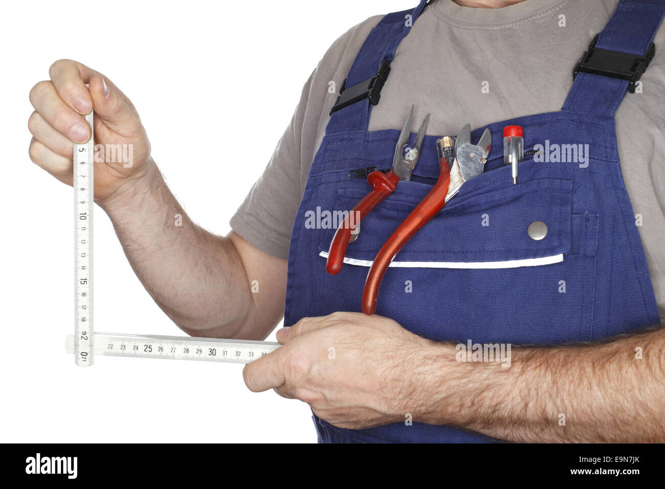 working man with metering tool Stock Photo - Alamy