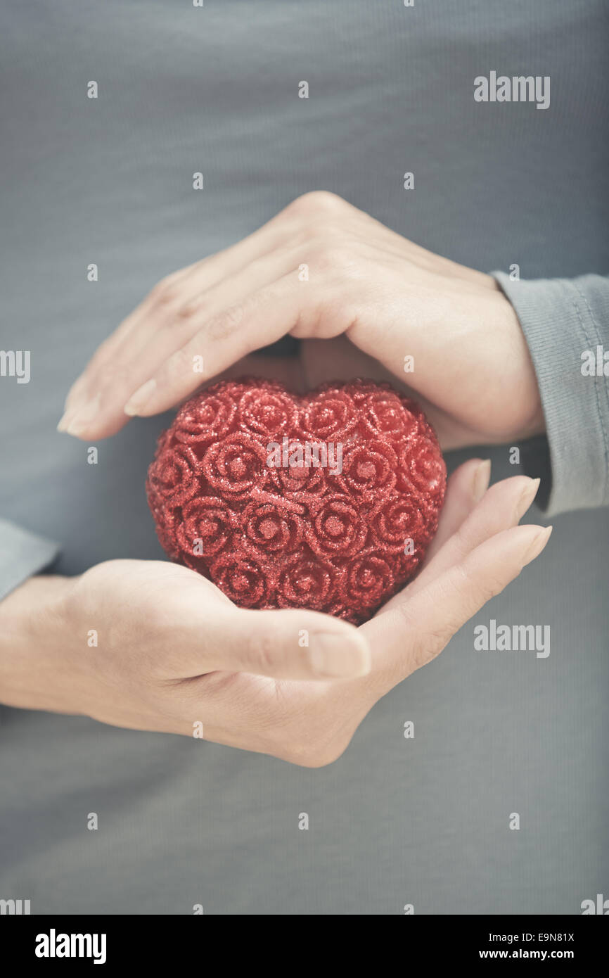 Hands with heart Stock Photo - Alamy
