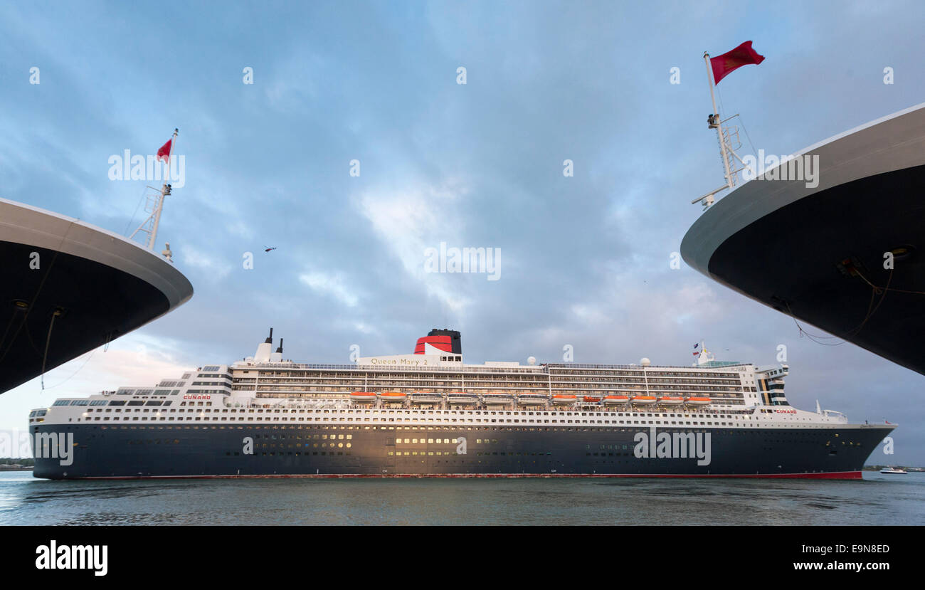 The Cunard liners Queen Elizabeth (right) and Queen Victoria take up ...