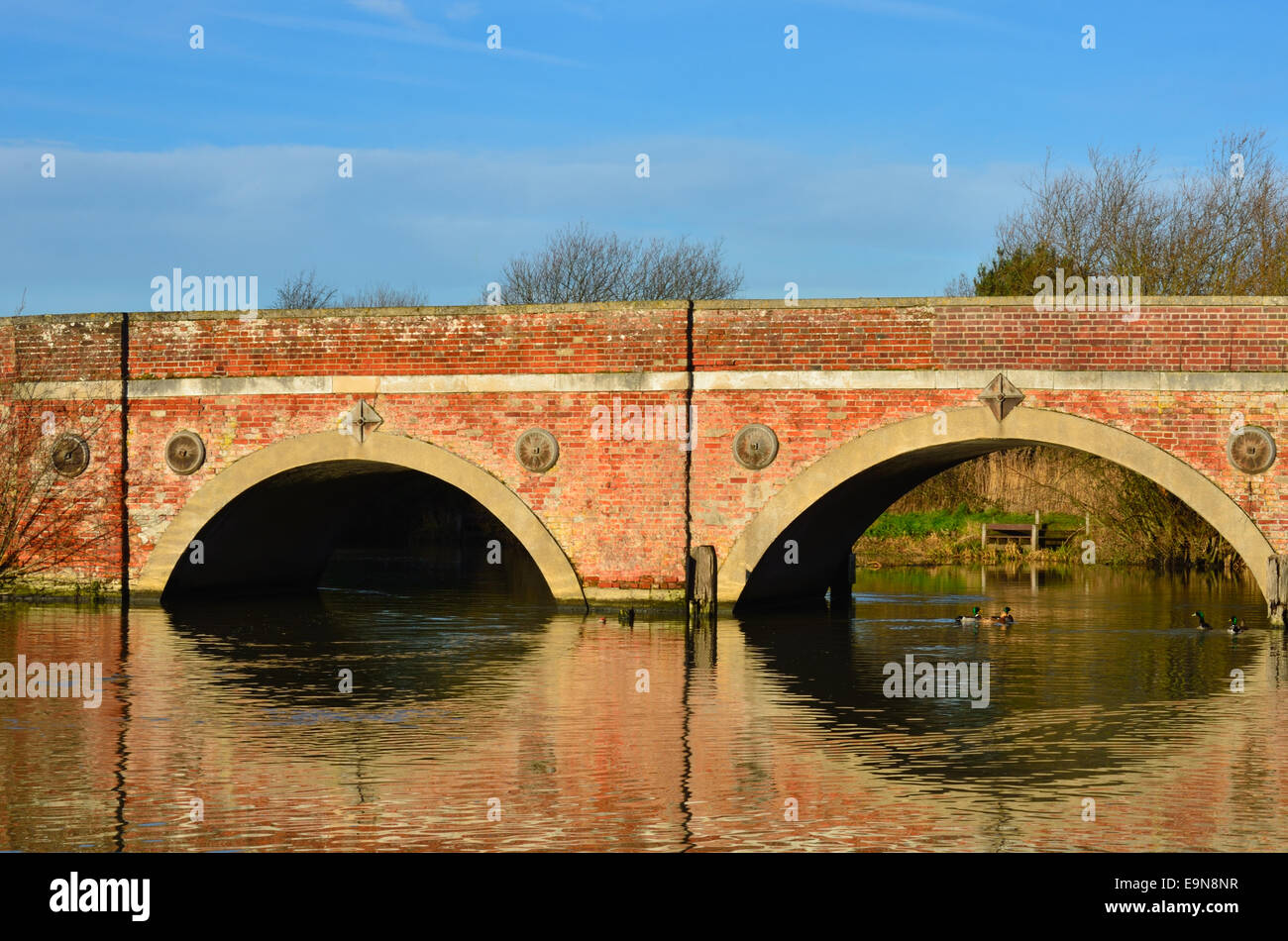 Red brick bridge in winter hi-res stock photography and images - Alamy