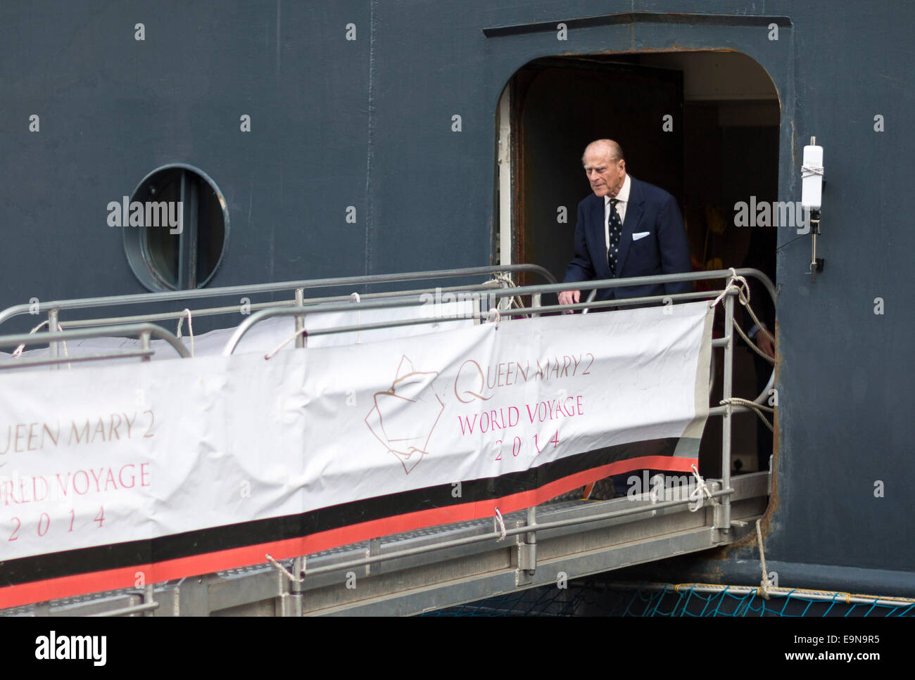 The Duke of Edinburgh walks down the gangway as he leaves lunch onboard ...