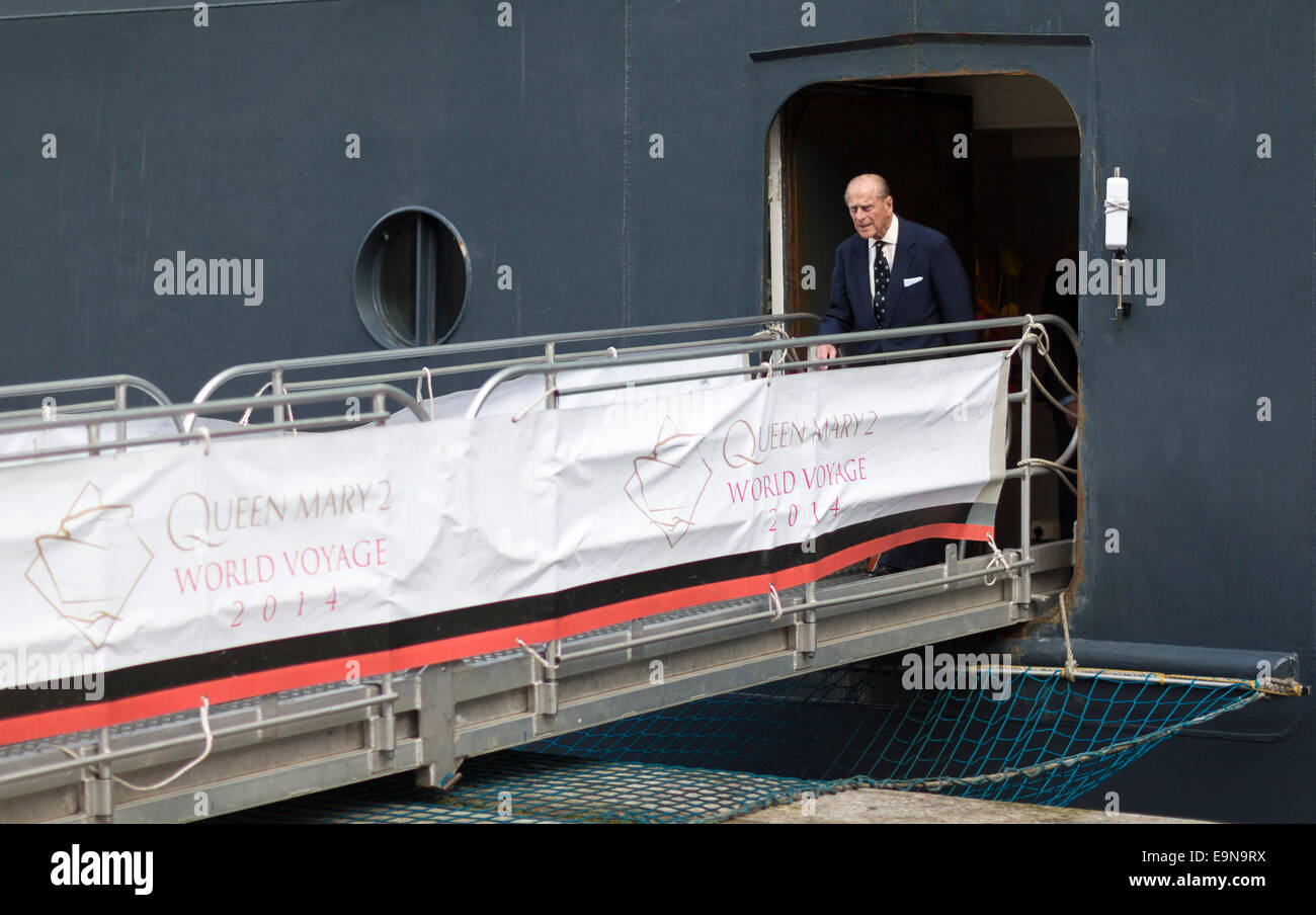 The Duke of Edinburgh walks down the gangway as he leaves lunch onboard ...