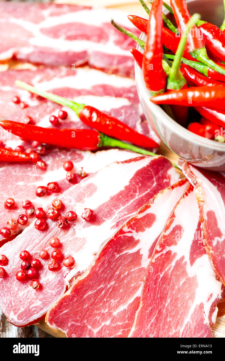 Cured meat with chilli pepper Stock Photo - Alamy