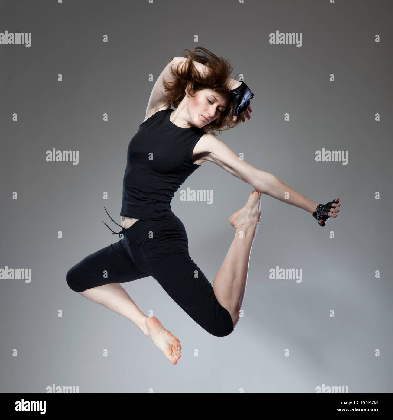 attractive jumping woman Stock Photo - Alamy