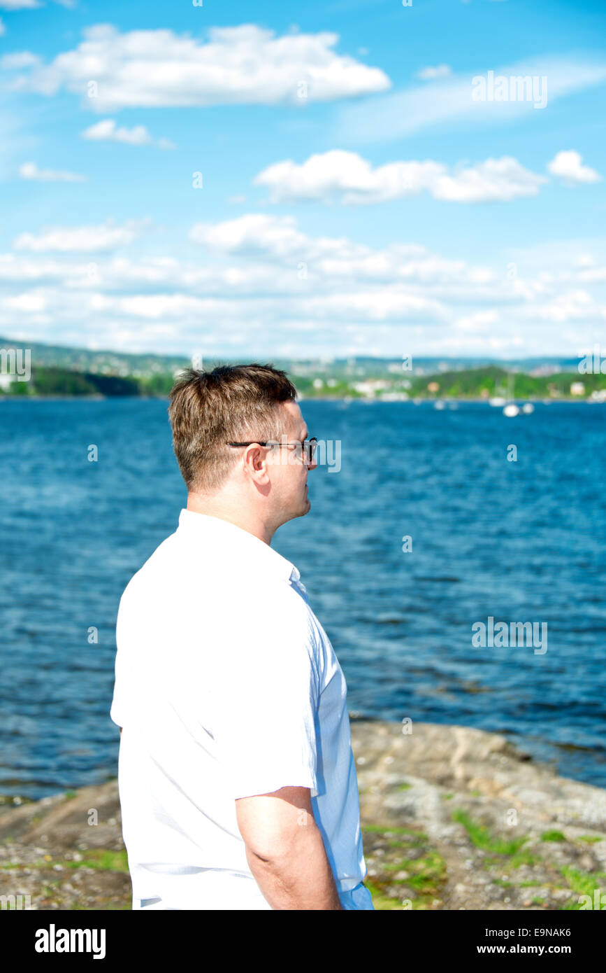 man portrait with sea on background Stock Photo - Alamy