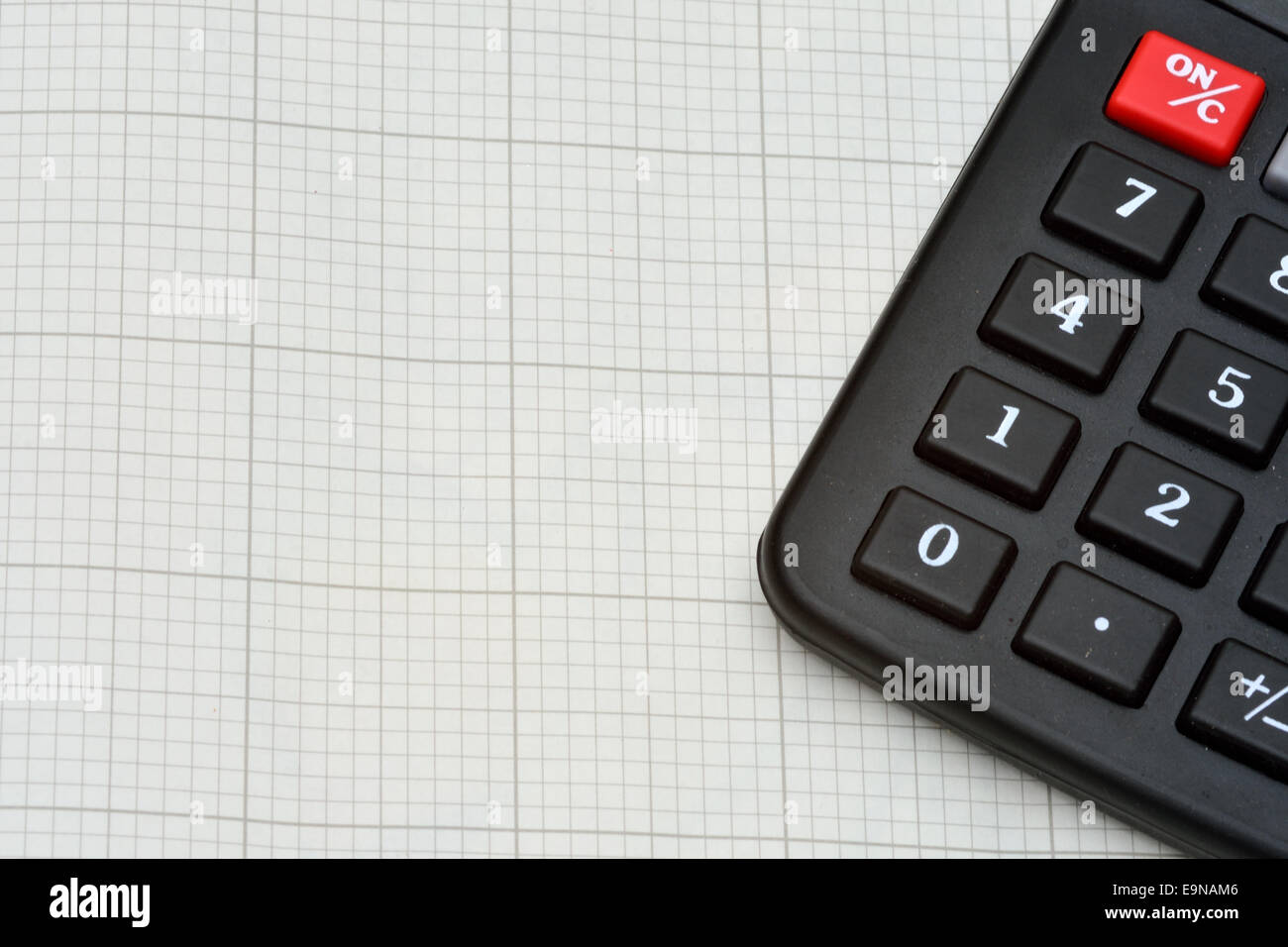 Detail of calculator and graph paper Stock Photo - Alamy