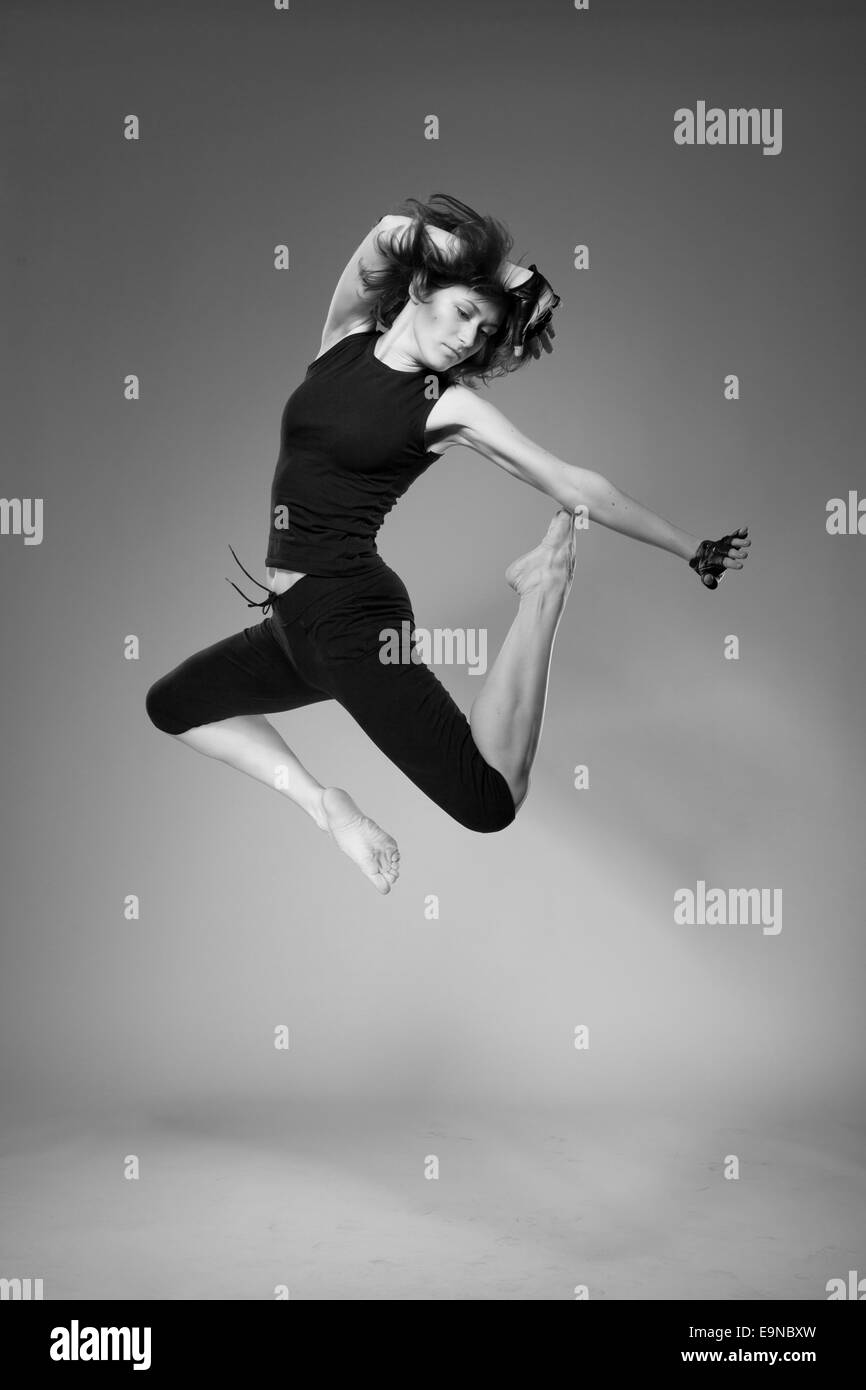attractive jumping woman Stock Photo - Alamy