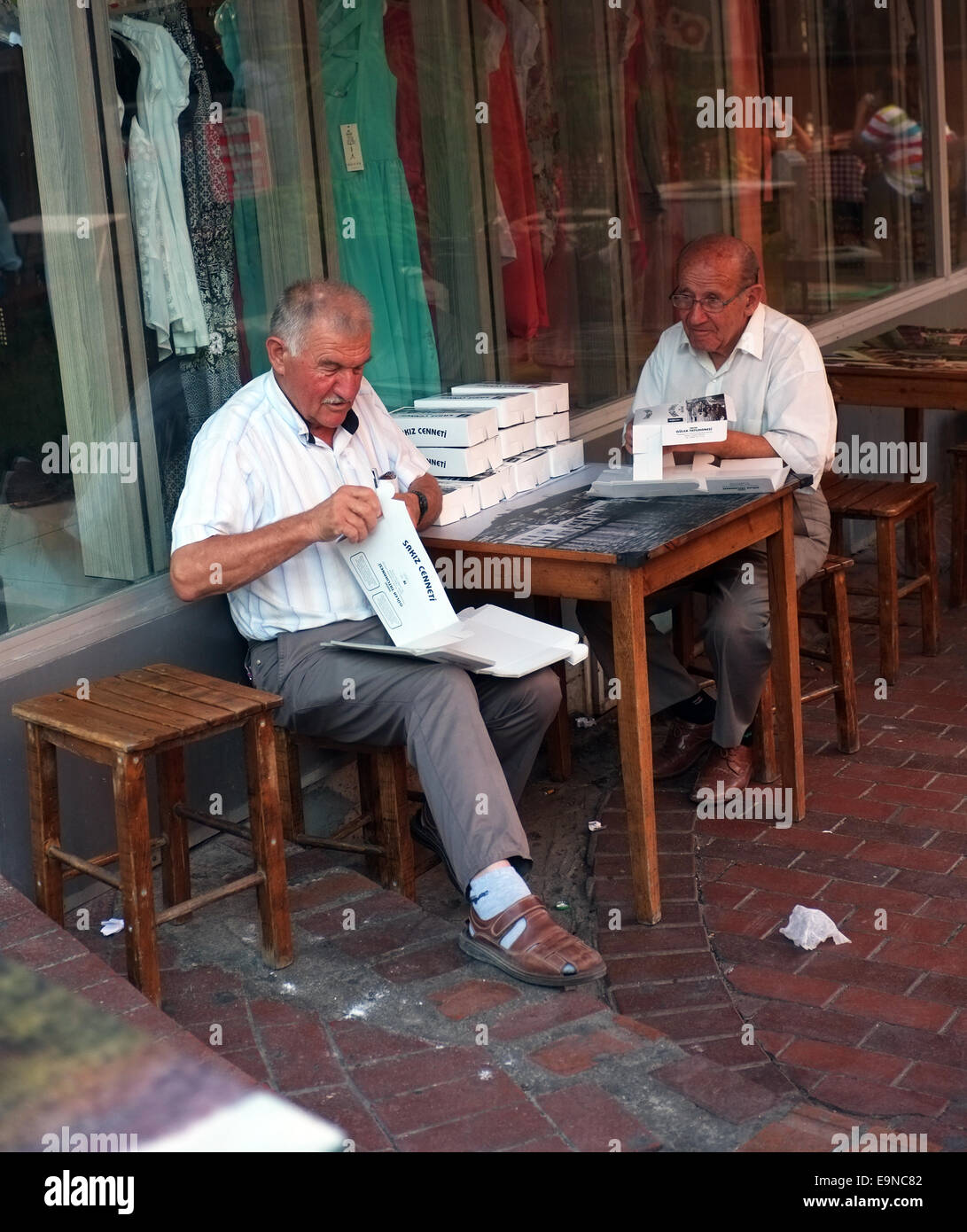 Two elderly men work outdoors Stock Photo - Alamy