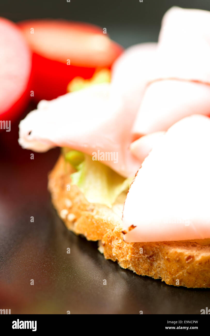 Sandwich turkey tomato salad leaf vertical Stock Photo - Alamy