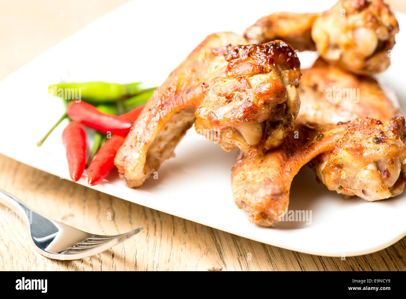 Hot chicken wings on plate Stock Photo - Alamy