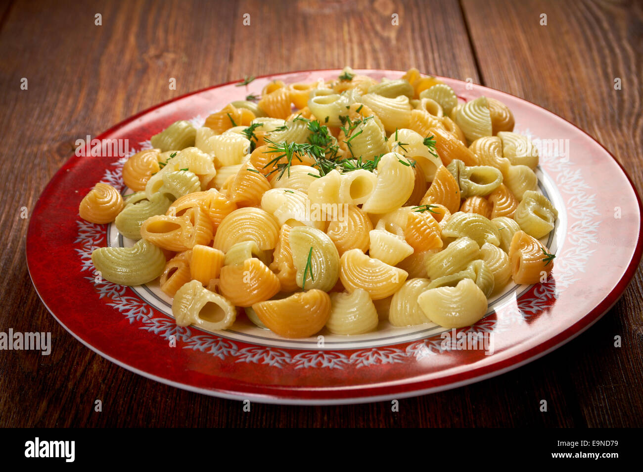 Colorful Italian conchiglie pasta Stock Photo - Alamy