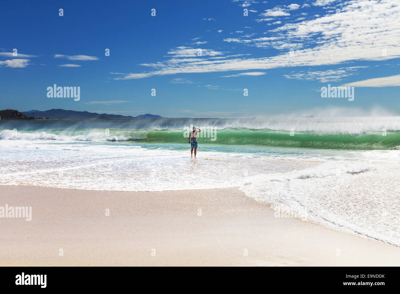 Men on the beach Stock Photo - Alamy