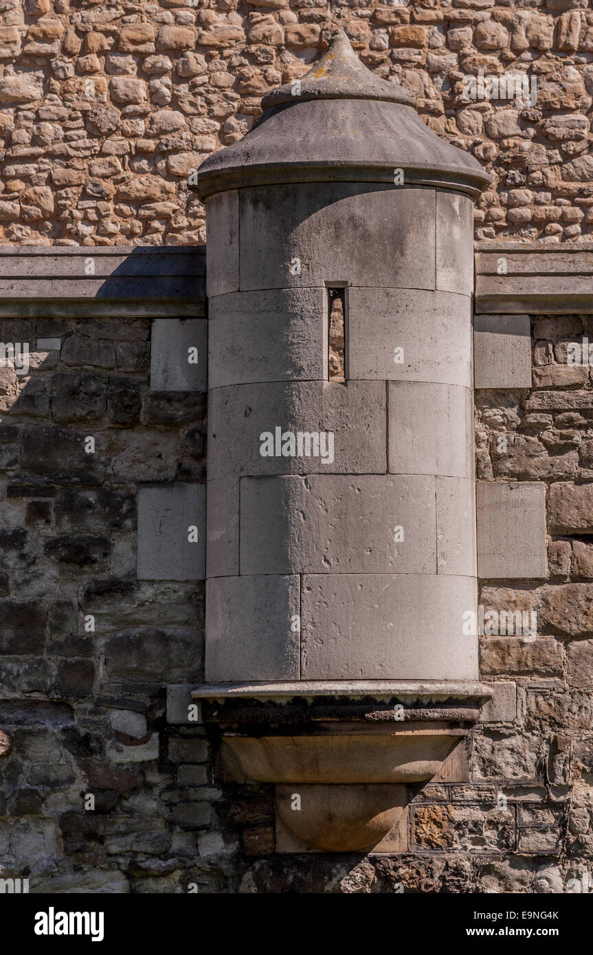 A small turret with a slit on the outer wall of the Tower of London ...