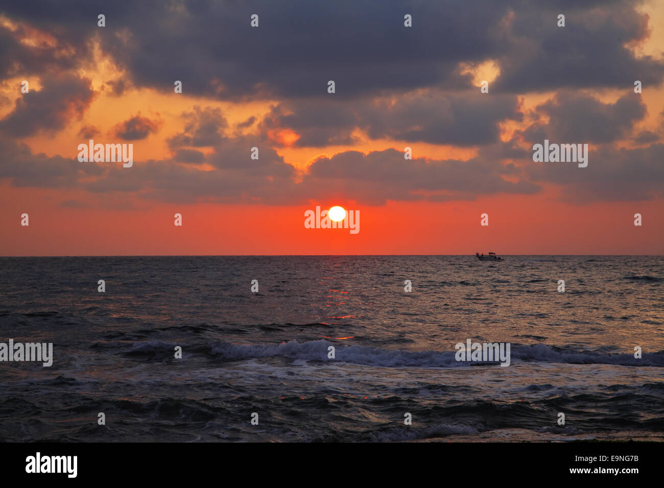 Magnificent sunset on coast Stock Photo - Alamy