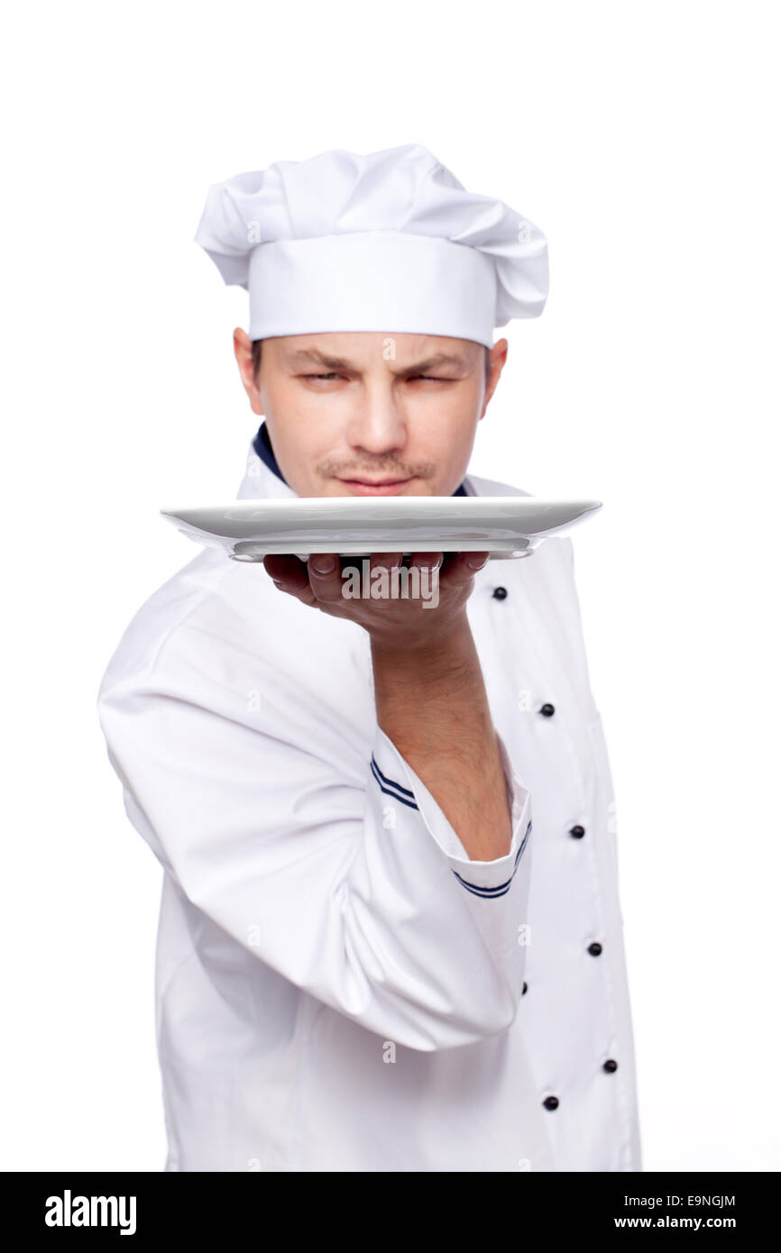 chef holding empty plate Stock Photo - Alamy