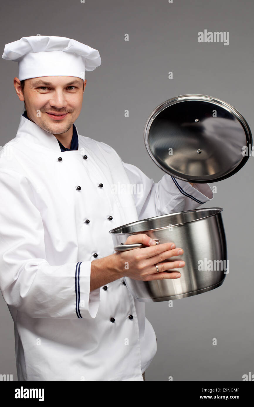Chef cooking with pot Stock Photo - Alamy