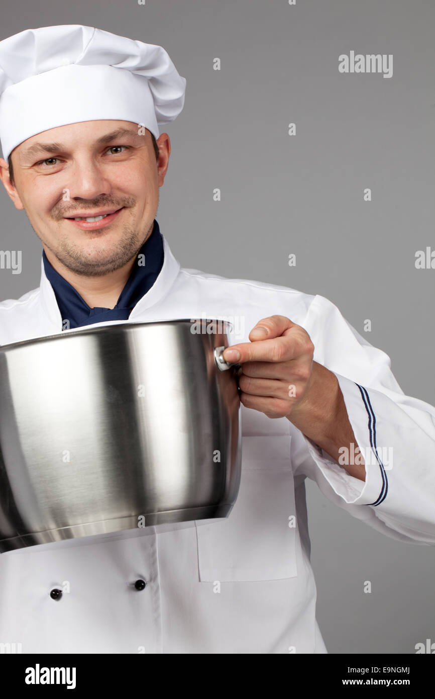 Chef cooking with pot Stock Photo - Alamy
