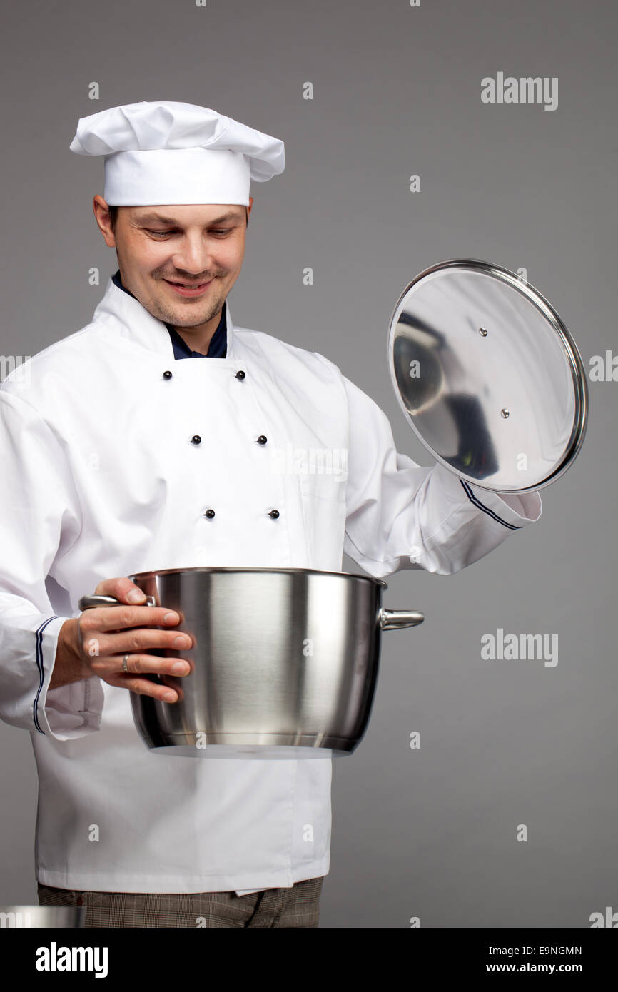 Chef cooking with pot Stock Photo - Alamy