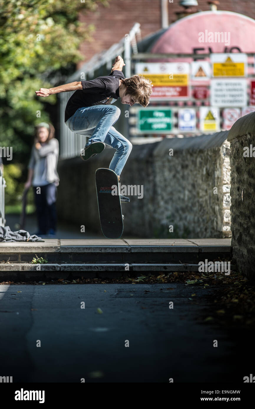 Teenage boys skateboarding on a summer afternoon UK Stock Photo - Alamy