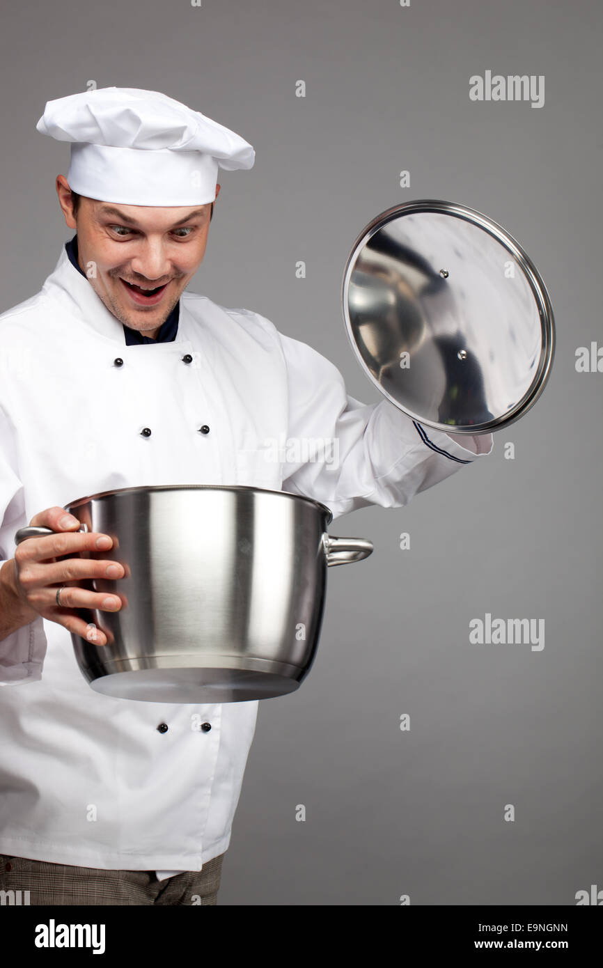 Chef cooking with pot Stock Photo - Alamy