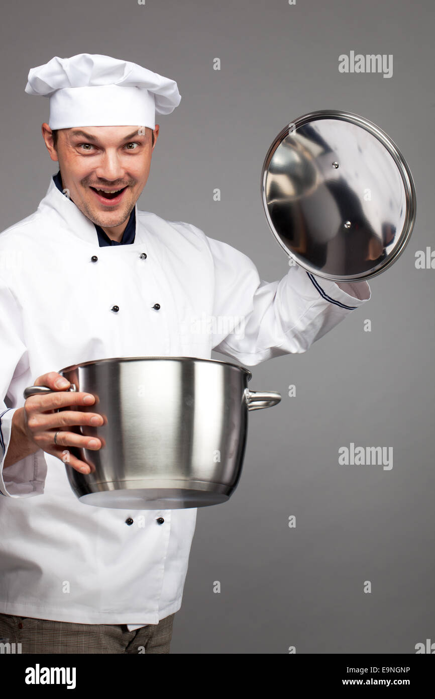 Chef cooking with pot Stock Photo - Alamy