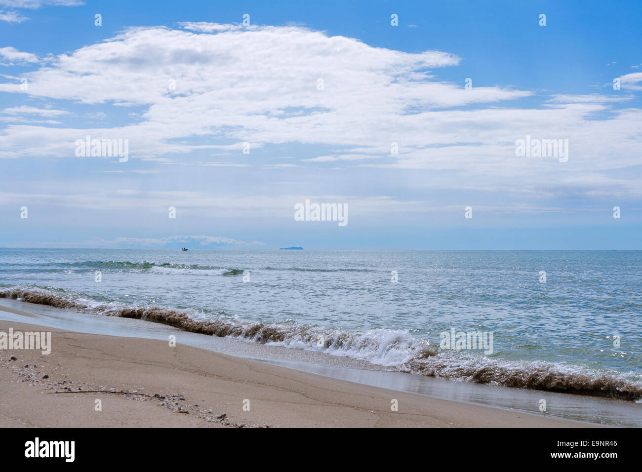 Tuscany sand beach with island, Italy Stock Photo - Alamy
