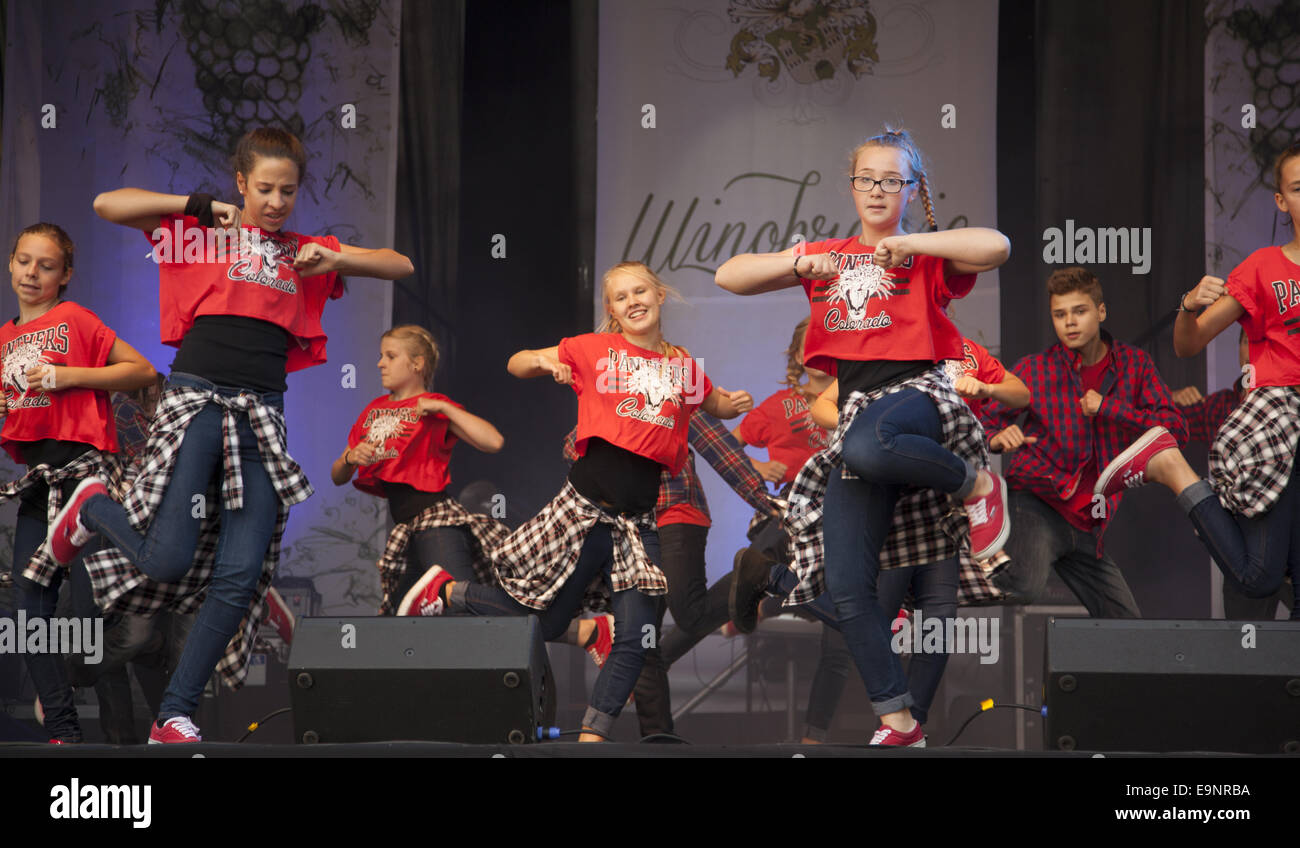 Teenage hip hop influenced dance group performs at a summer arts ...