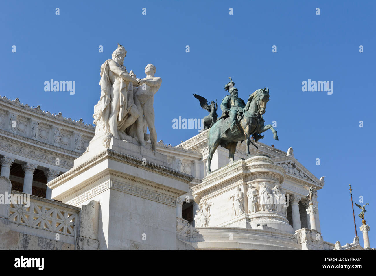 The iconic Victor Emmanuel II white building with historical statues in ...