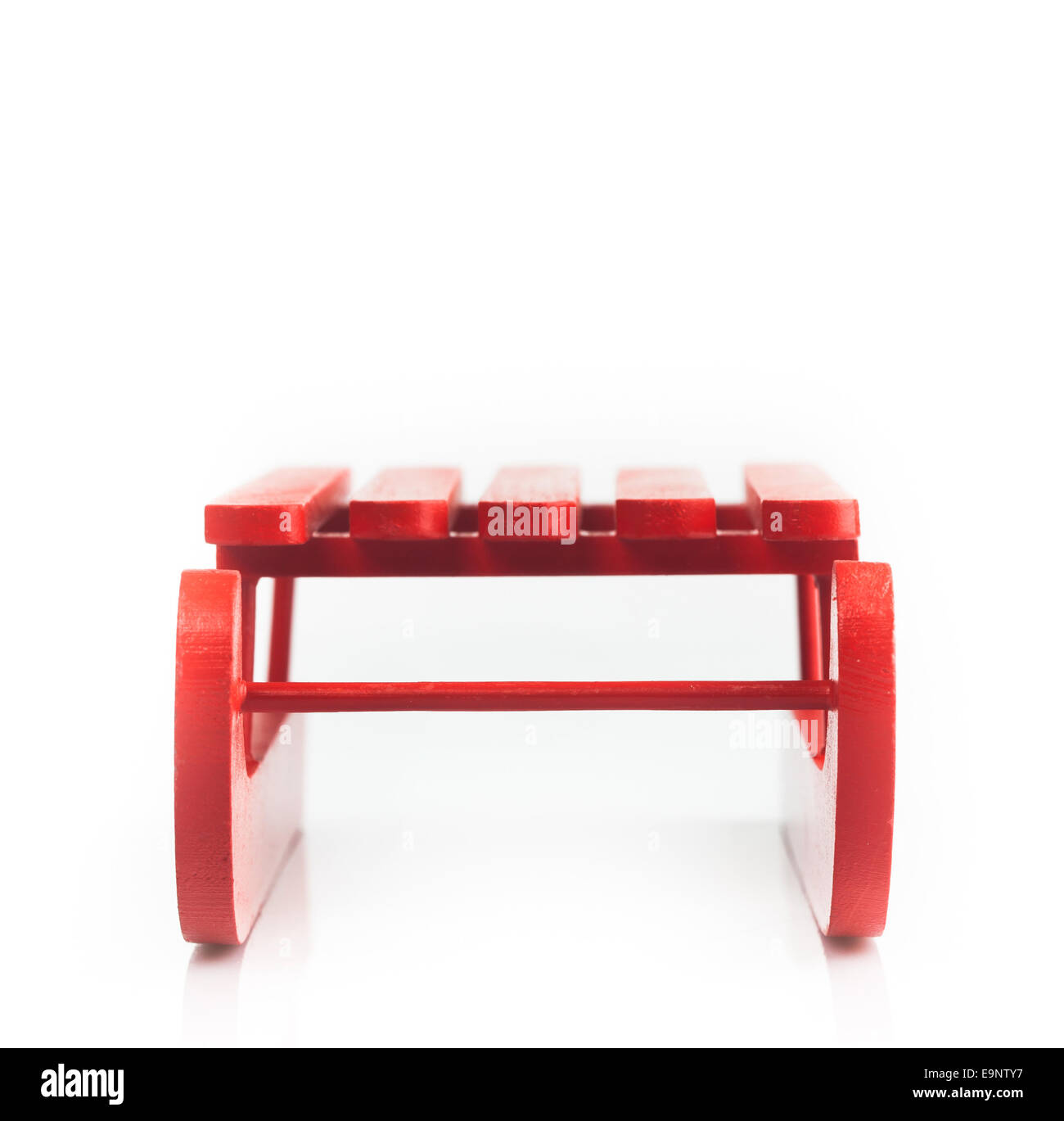 Wooden red sled isolated on white background Stock Photo - Alamy