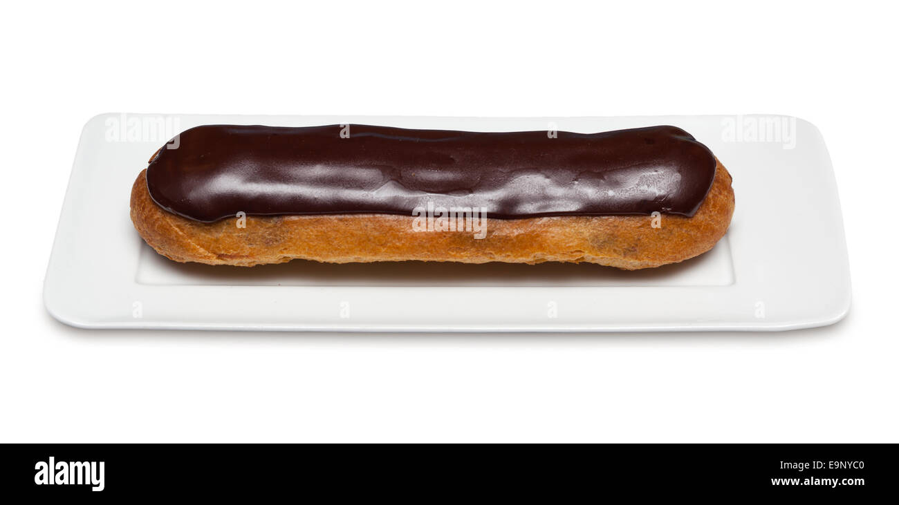 Chocolate eclair in the plate isolated on white background Stock Photo ...
