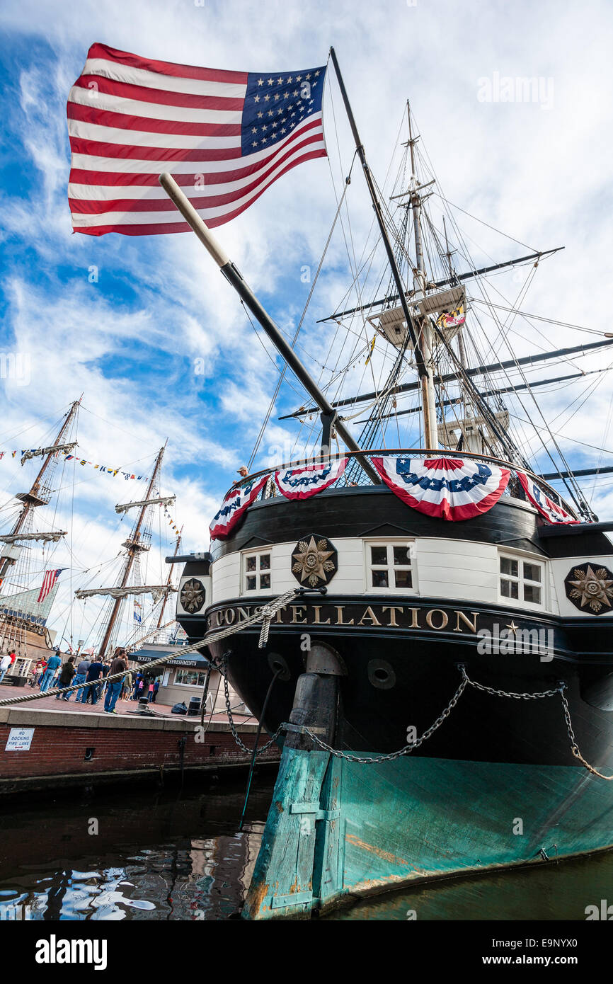 USS Constellation in Baltimore's Inner Harbor, flying a huge US flag ...