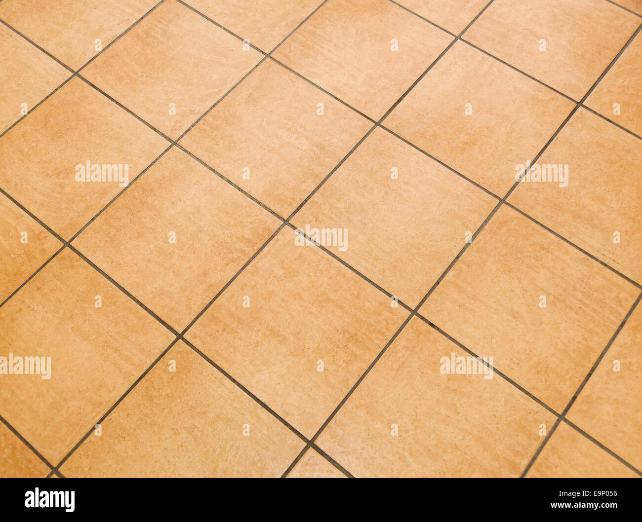 Brown ceramic floor tiles close up texture Stock Photo - Alamy