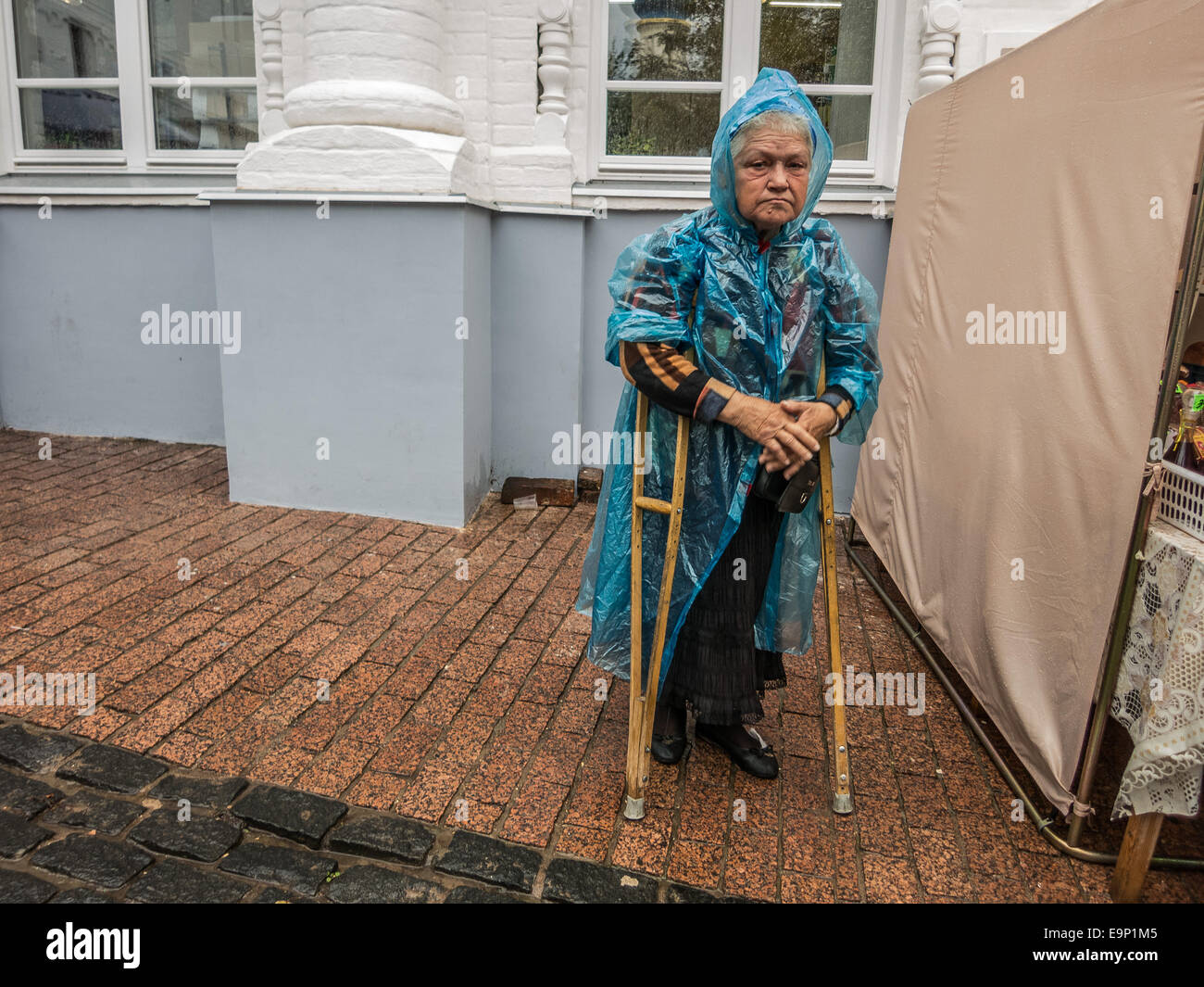 Disabled woman begging for money in St. Sergius Lavra in Sergiev Posad ...
