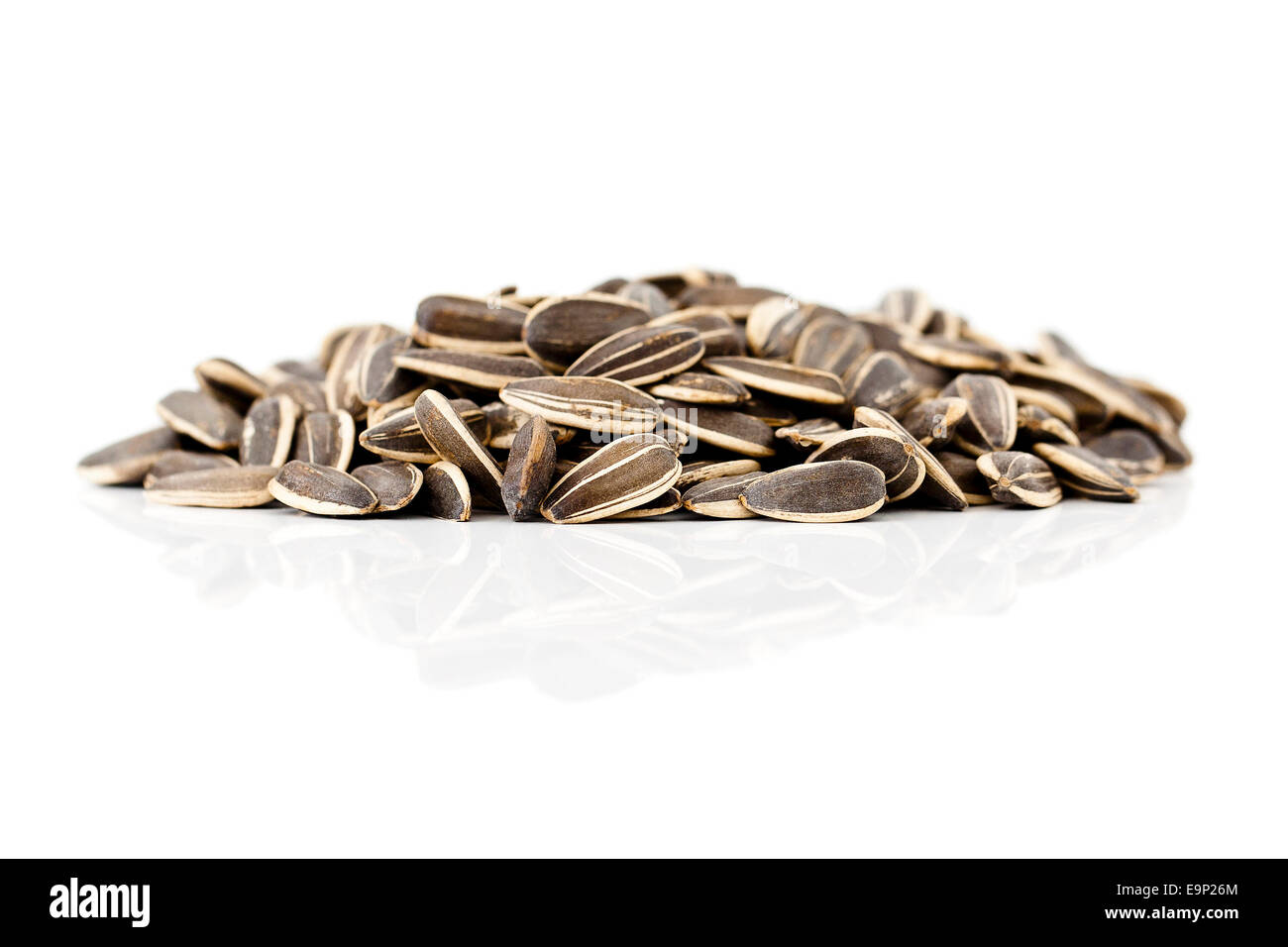 Sunflower seeds on white background Stock Photo - Alamy