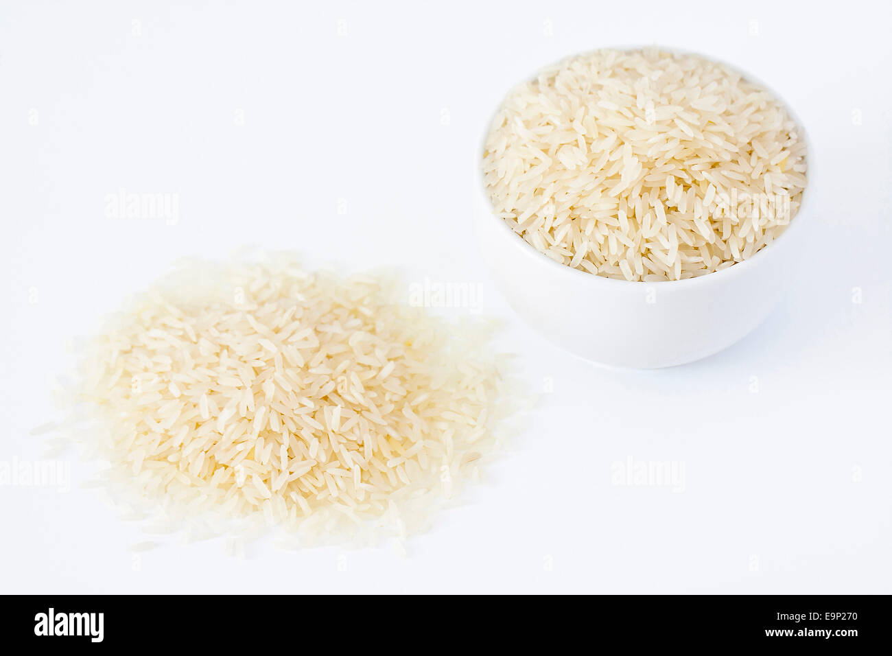 White rice on white background Stock Photo - Alamy