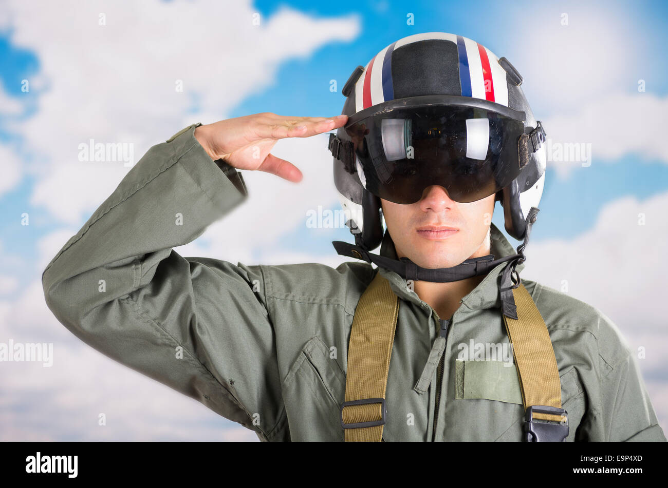 portrait of young pilot wearing helmet with a sky background Stock ...