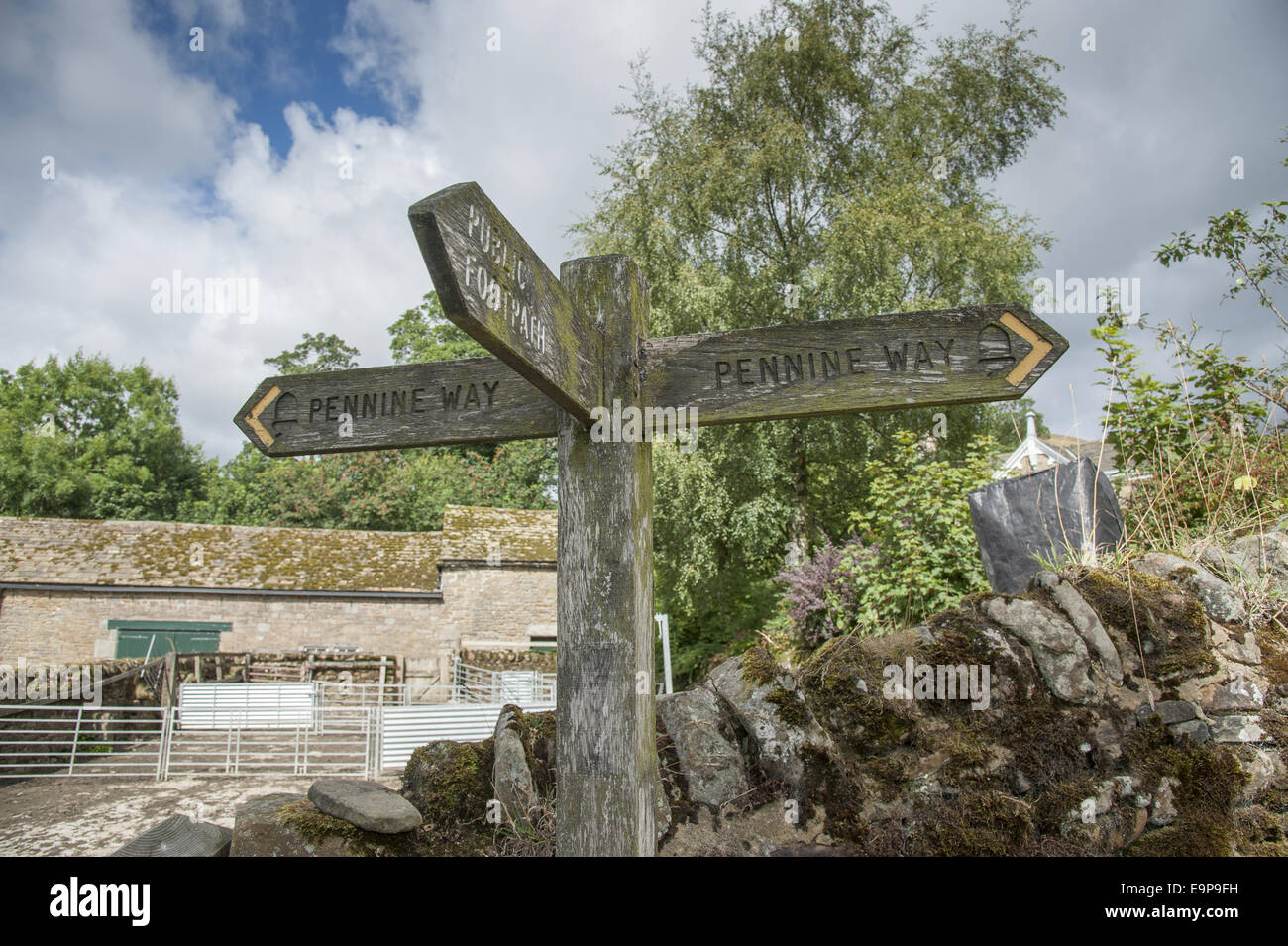 'Pennine Way' and 'Public Footpath' signs on farm, Edale, Peak District ...