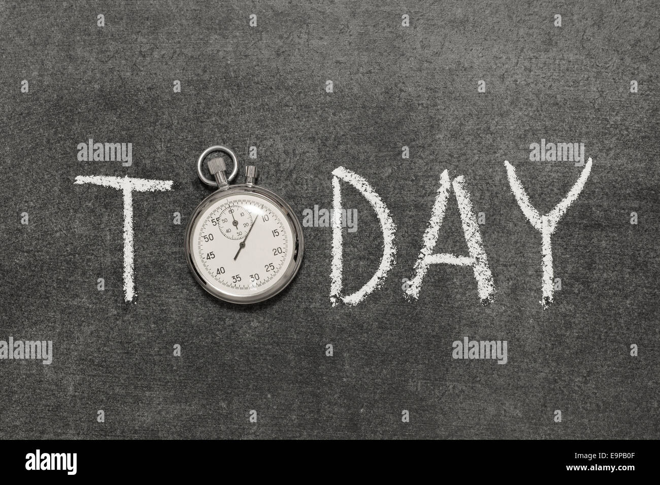 today word handwritten on chalkboard with vintage precise stopwatch ...