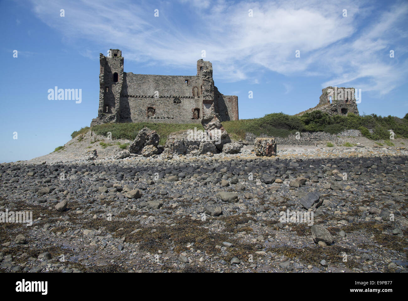 View of rocky beach and ruined castle, Piel Castle, Piel Island ...