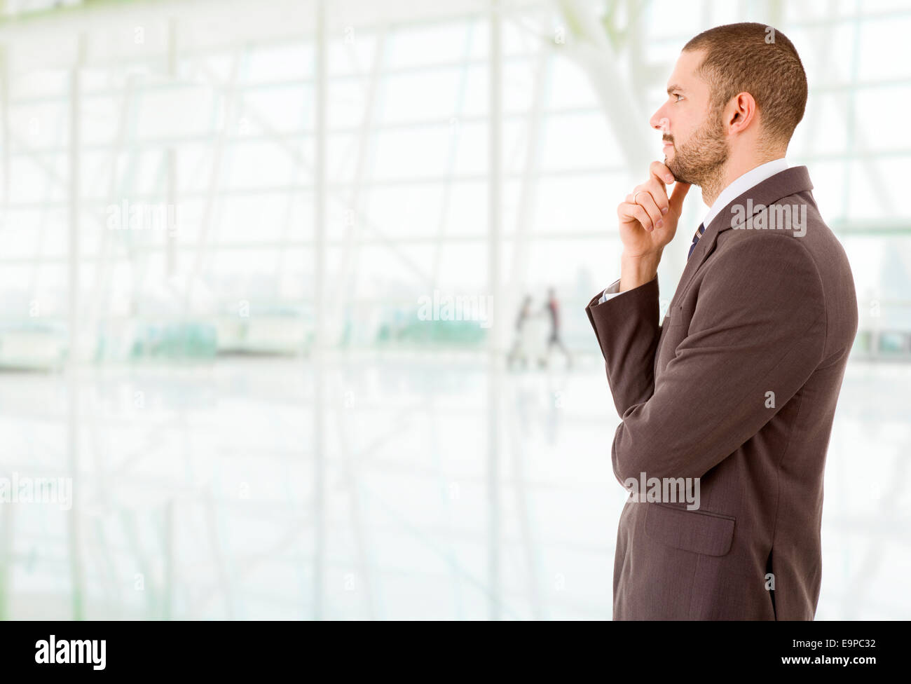 young business man thinking at the office Stock Photo - Alamy