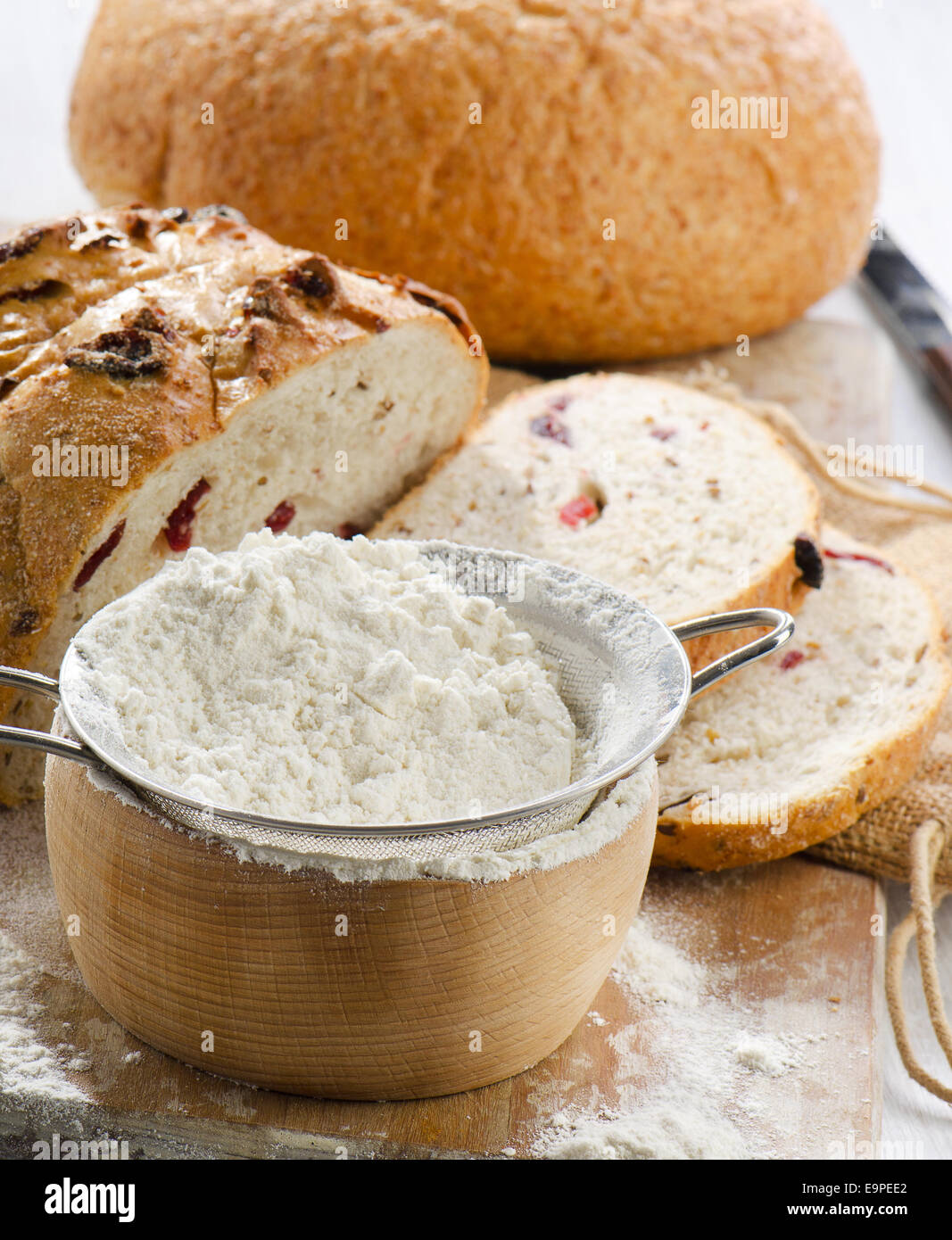 Flour freshly baked loaf bread wooden table hi-res stock photography ...