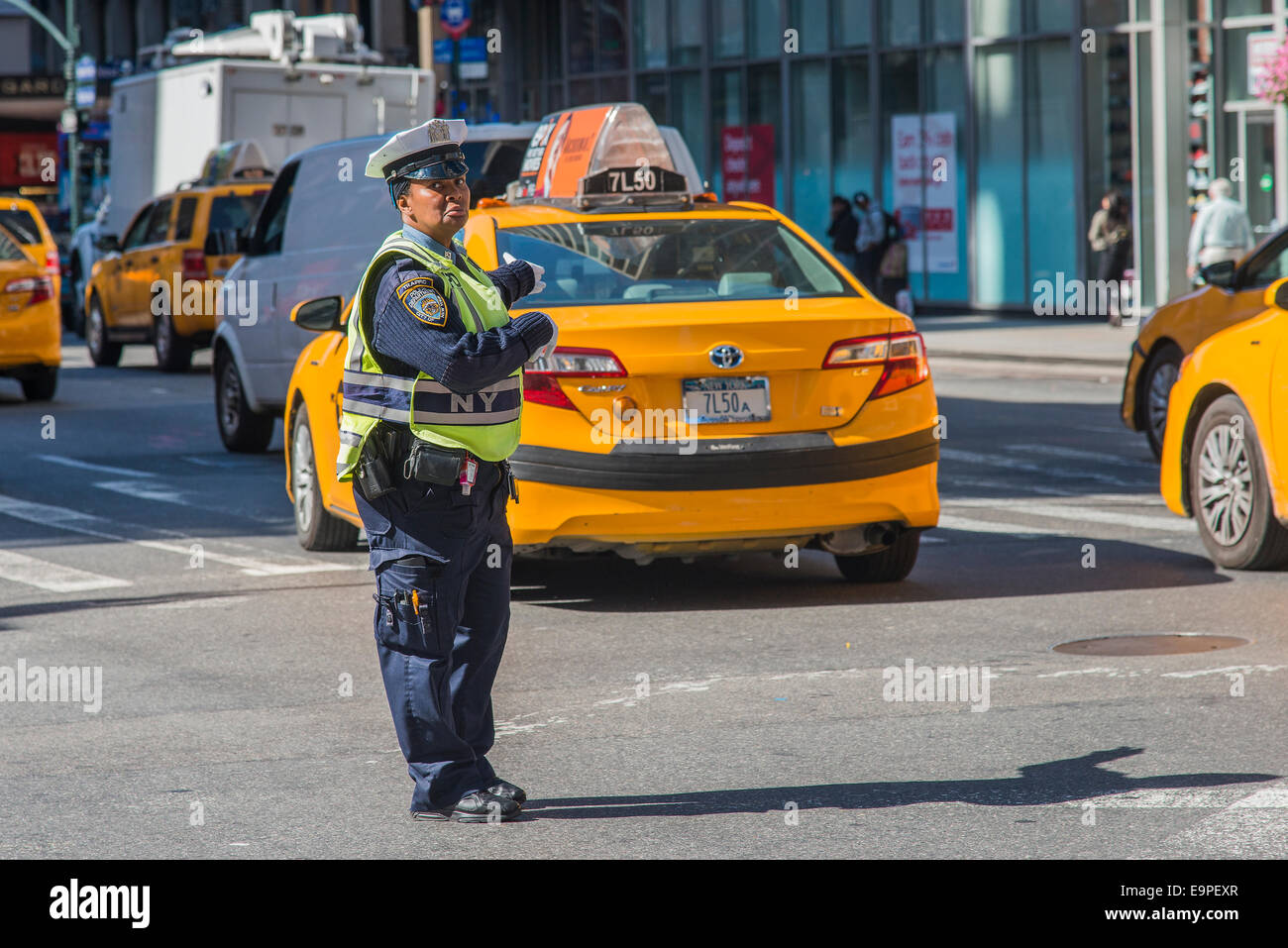 A New York Police Traffic Department Officer controlling traffic in New ...