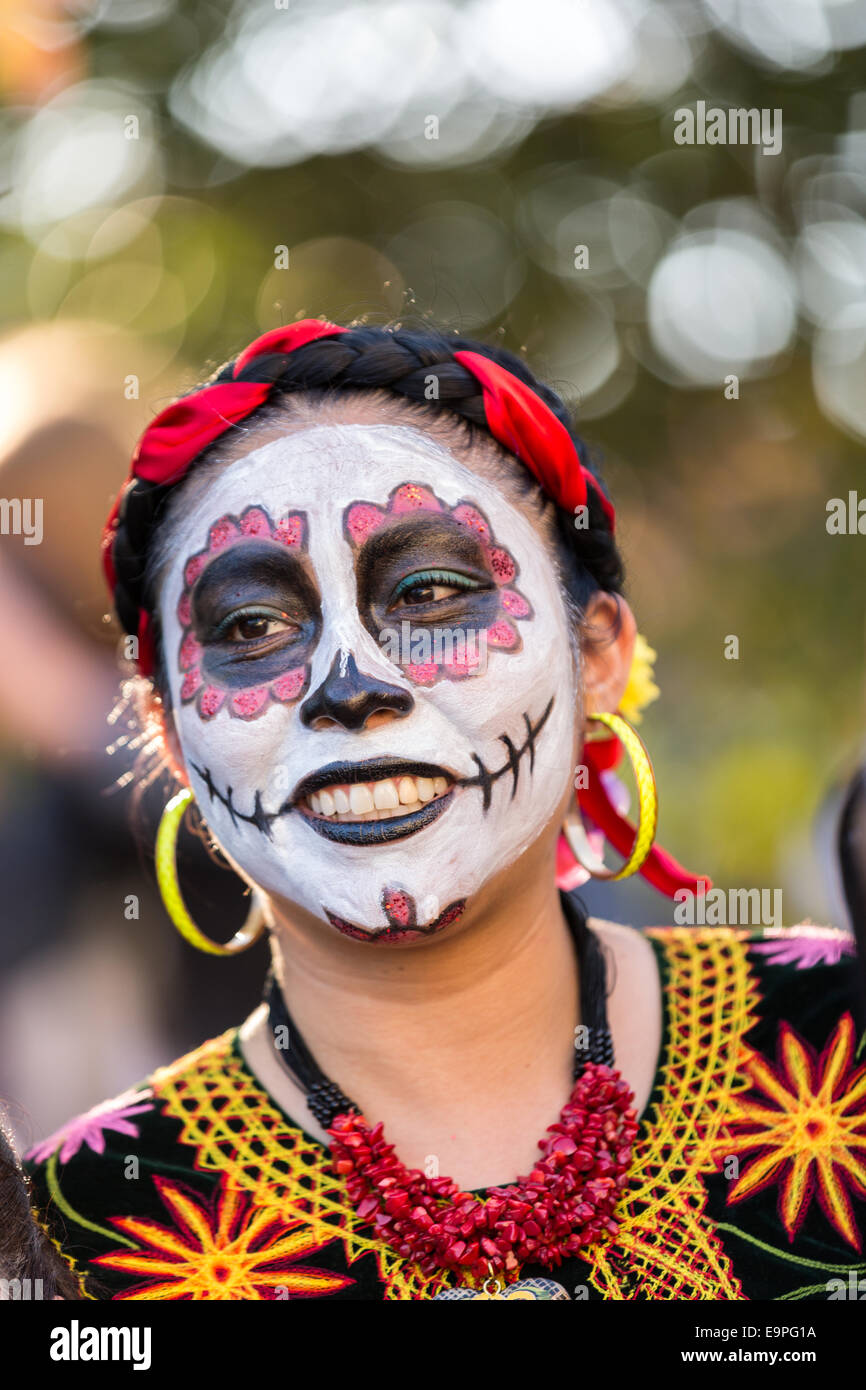 A woman dressed as Catrina, the bride of death, during the Day of the ...