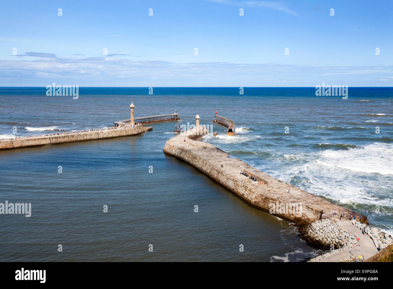 The West and East Piers in Summer at Whitby Yorkshire Coast England ...