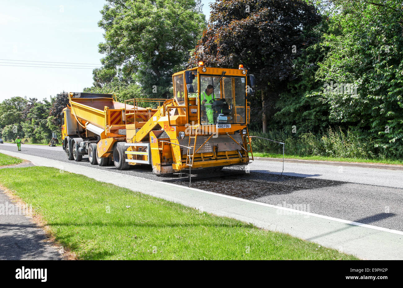 A lorry or truck tarmacing or laying tarmac on a main road Stoke-on ...