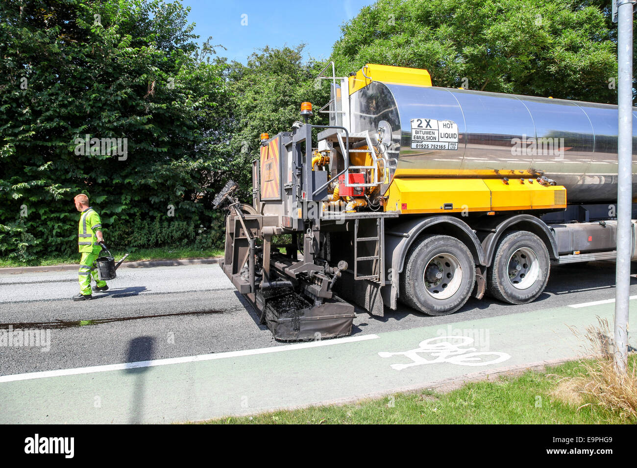 A lorry or truck tarmacing or laying tarmac on a main road Stoke-on ...